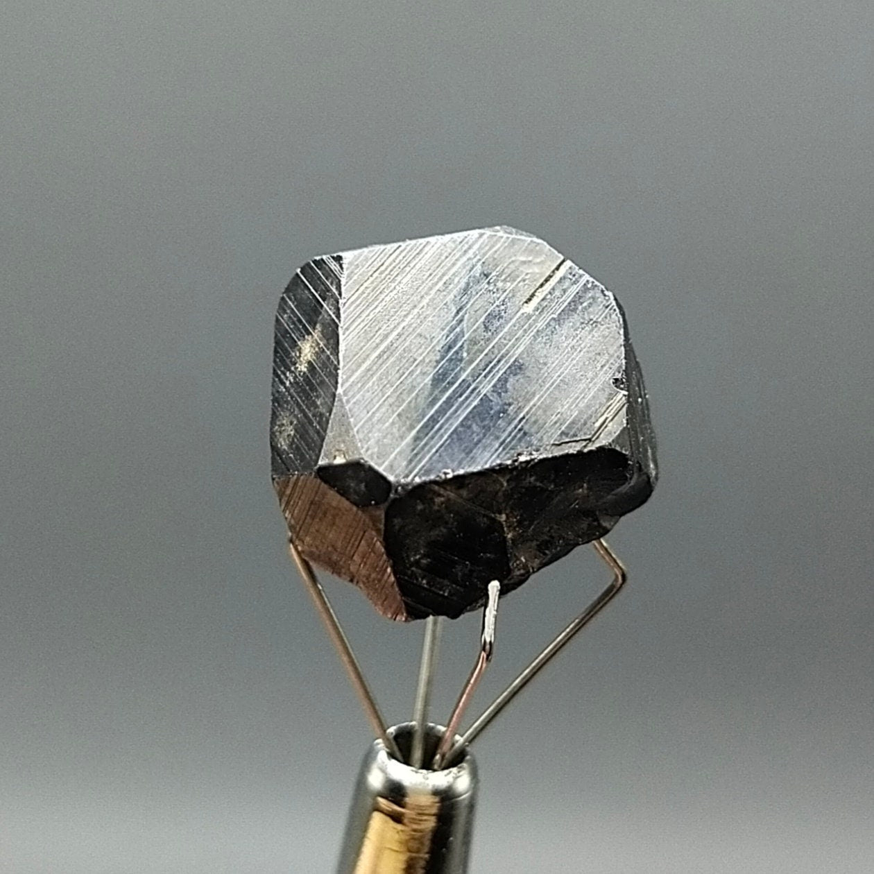 Black Magnetite crystal with octahedral structure and patterns on ...